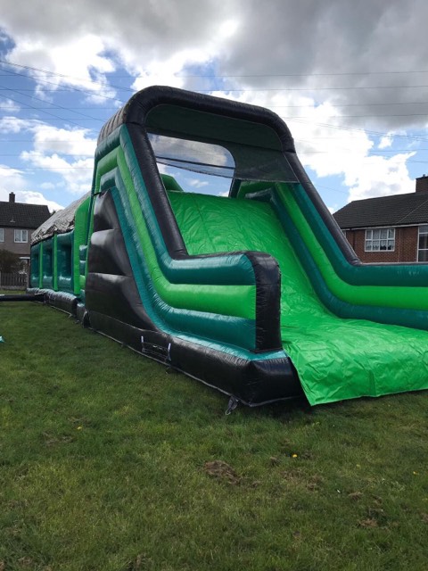 Green Giant 70ft assault course inflatable assault- course hire